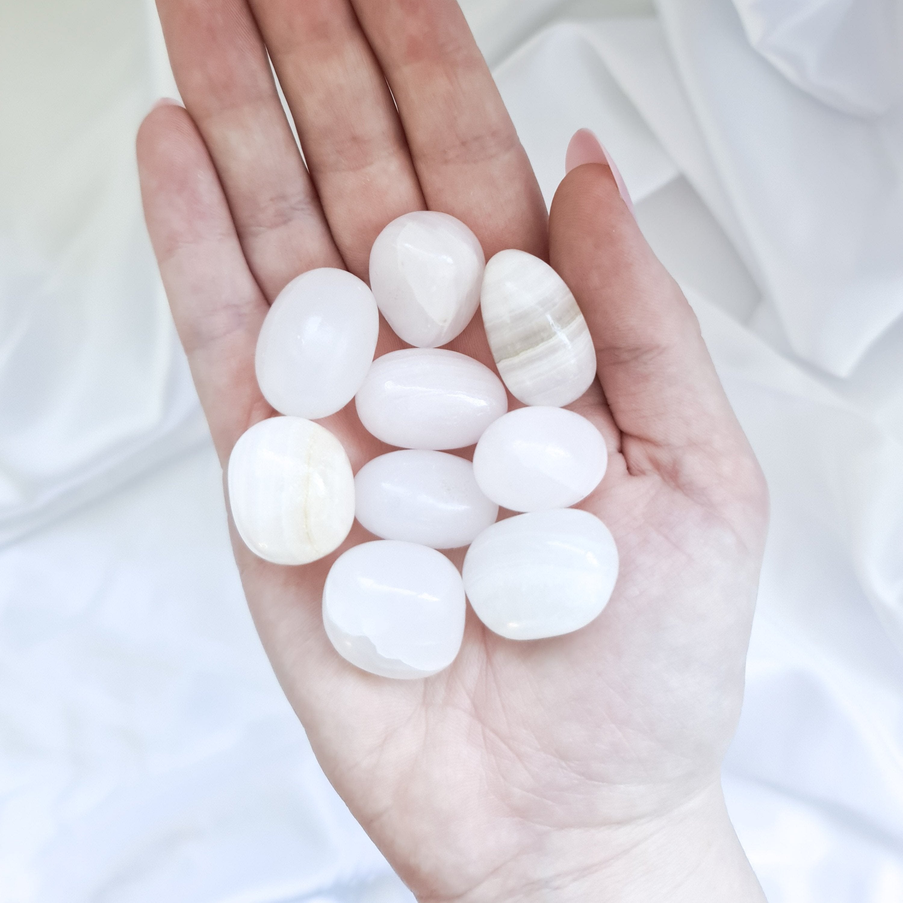 Mangano Calcite Tumbled Stones | Celestial Crystals